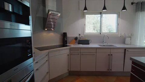 Slow pull-out shot of a modern kitchen w... | Stock Video | Pond5