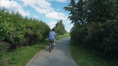 Slow ride rear view | Stock Video | Pond5