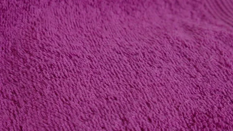 Slow sliding on texture of pink towel 4K... | Stock Video | Pond5
