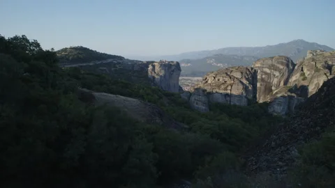 Slow tilting on Meteora rocks with Holy ... | Stock Video | Pond5