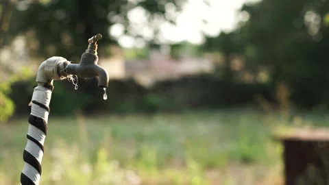 Slow water dripping from Outdoor tap on ... | Stock Video | Pond5