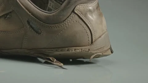 Slow zoom in of damaged shoe heel of hik... | Stock Video | Pond5