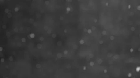 slowly falling snow on a dark background | Stock Video | Pond5