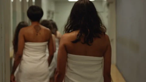 Slowmotion of female inmates in towels g... | Stock Video | Pond5