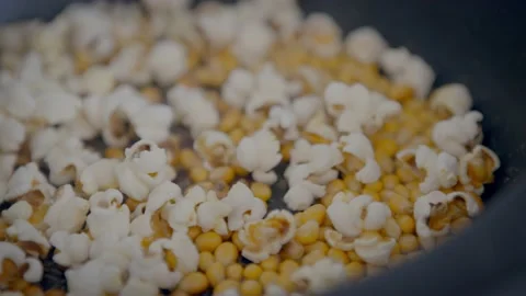 Slowmotion of homemade popcorn popping w... | Stock Video | Pond5