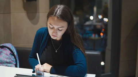 Slowmotion shot of a woman drawing on di... | Stock Video | Pond5