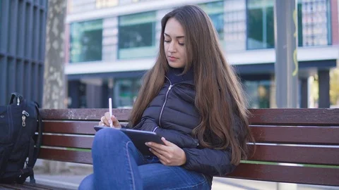 Slowmotion shot of a woman drawing on di... | Stock Video | Pond5