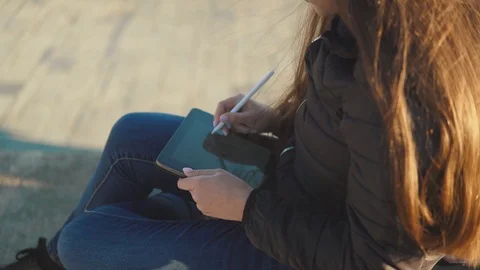 Slowmotion shot of a woman drawing on di... | Stock Video | Pond5