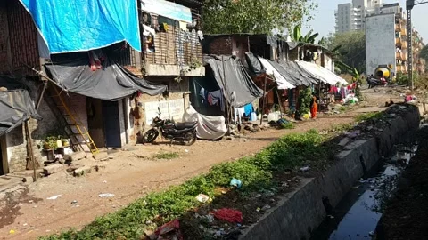 Slum area of Mumbai, side view form runn... | Stock Video | Pond5