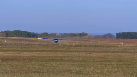 Small airplane with a rotating propeller... | Stock Video | Pond5