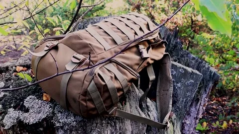 A small army backpack in coyote color on... | Stock Video | Pond5