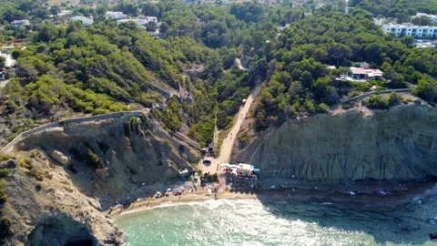 Small beach bar on nudist hippie beach o... | Stock Video | Pond5