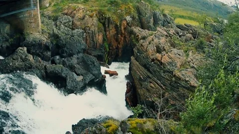 Small beautiful waterfall from top view.... | Stock Video | Pond5