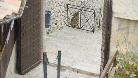 Small black gate and fence on the stairs... | Stock Video | Pond5