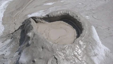 Small bubbleling boiling active mud volc... | Stock Video | Pond5