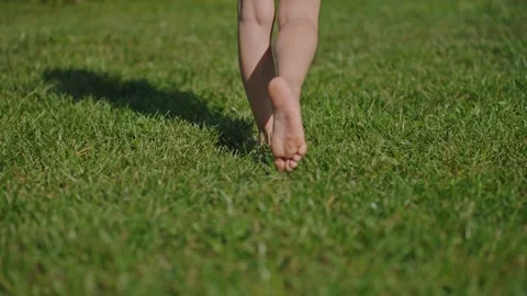 Child Barefoot Stock Footage ~ Royalty Free Stock Videos | Pond5