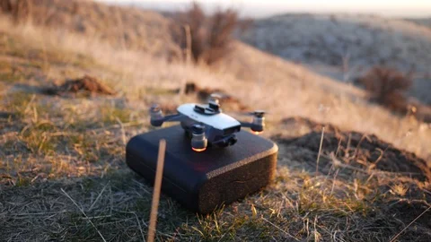 small drone taking off from landing pad | Stock Video | Pond5