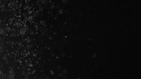 Small dust particles floating through th... | Stock Video | Pond5