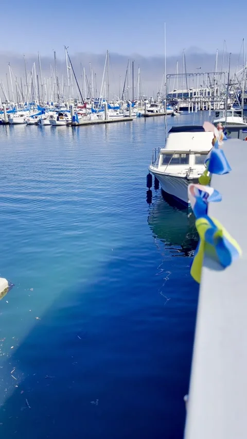 Small flags flapping in wind at boat mar... | Stock Video | Pond5
