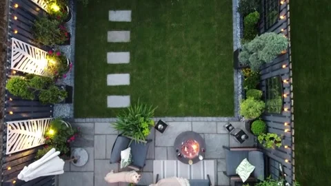 Small Garden Aerial View with Cozy Patio... | Stock Video | Pond5
