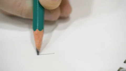 Small hand drawing on blank paper with a... | Stock Video | Pond5