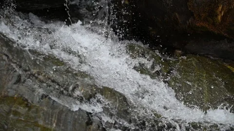 Small mountain waterfall flume gushing o... | Stock Video | Pond5