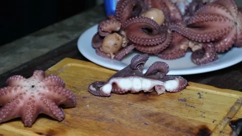 Small Octopus cooked soft-bodied cut wit... | Stock Video | Pond5