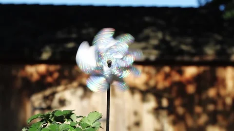 Small Pinwheel Spinning In Breeze With S... | Stock Video | Pond5