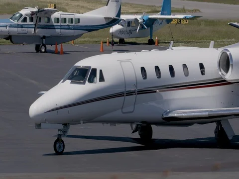 Small Private Jet Pulling Into Airport | Stock Video | Pond5