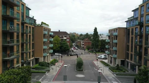 Small roundabout and maintained greenery... | Stock Video | Pond5