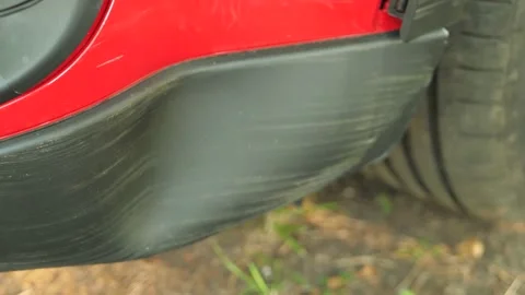 Small scratches in the paint of red car ... | Stock Video | Pond5