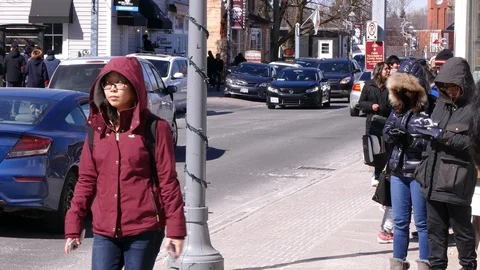 Small town main street sunny day with pe... | Stock Video | Pond5