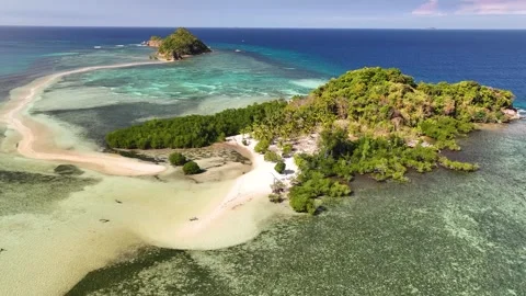 Small tropical islands connected by sand... | Stock Video | Pond5