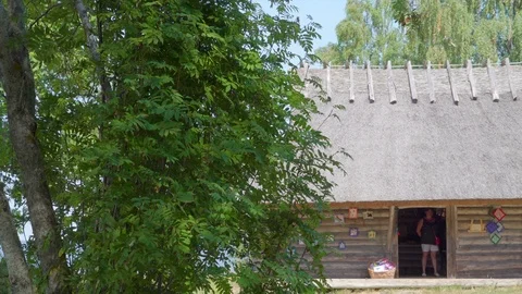 A small wooden hut with a person inside ... | Stock Video | Pond5