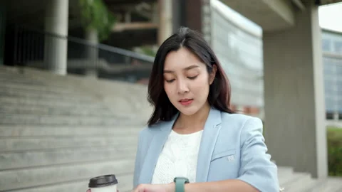 Smart female hurriedly walking and looki... | Stock Video | Pond5