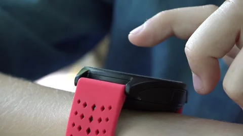 Smart Watch, Kid Using Smartwatch Outdoo... | Stock Video | Pond5