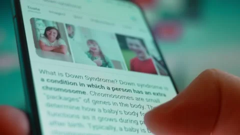 Smartphone in hand, looking for informat... | Stock Video | Pond5