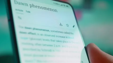 Smartphone in hand, looking for informat... | Stock Video | Pond5