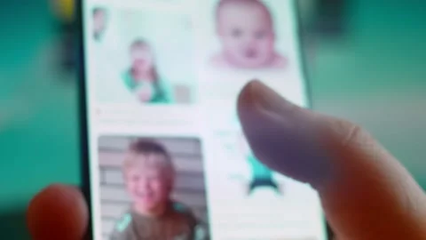 Smartphone in hand, looking for informat... | Stock Video | Pond5