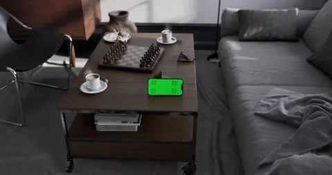 Smartphone place on coffee table, Green ... | Stock Video | Pond5