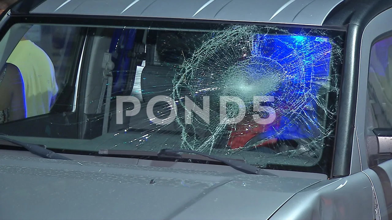 Broken Car Window At Night
