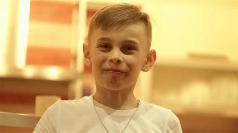 Smile of crazy funny boy looking at the ... | Stock Video | Pond5