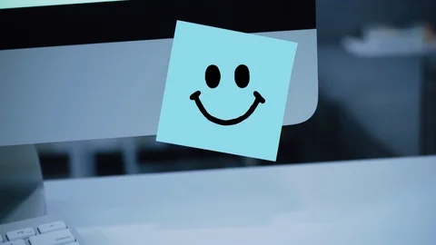 Smile drawing on sticker on monitor | Stock Video | Pond5