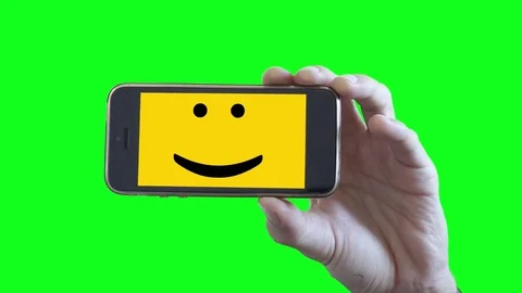 Smiley Face Smartphone On Green Screen B... | Stock Video | Pond5