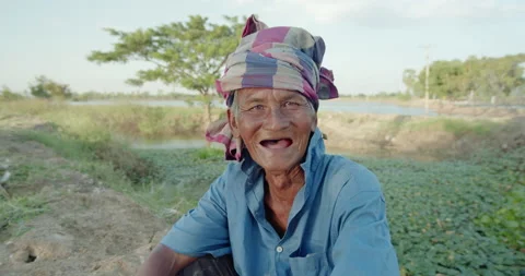 Smiling and laughing native Asian male f... | Stock Video | Pond5