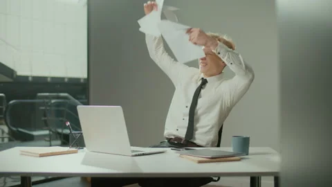 Smiling Business Man Scatterring Papers ... | Stock Video | Pond5