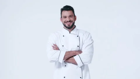 smiling chef in uniform with crossed arm... | Stock Video | Pond5