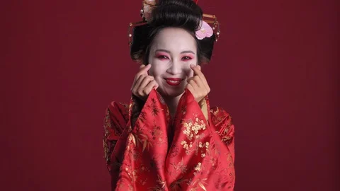 Smiling geisha woman in japanese kimono ... | Stock Video | Pond5