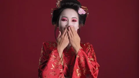 Smiling geisha woman in traditional kimo... | Stock Video | Pond5