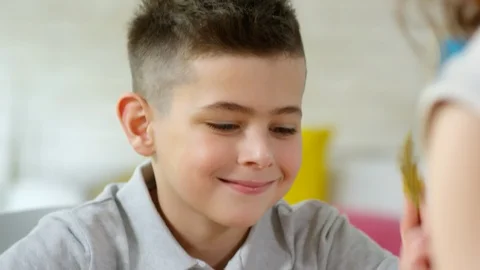 Smiling Little Boy Making Paper Craft wi... | Stock Video | Pond5